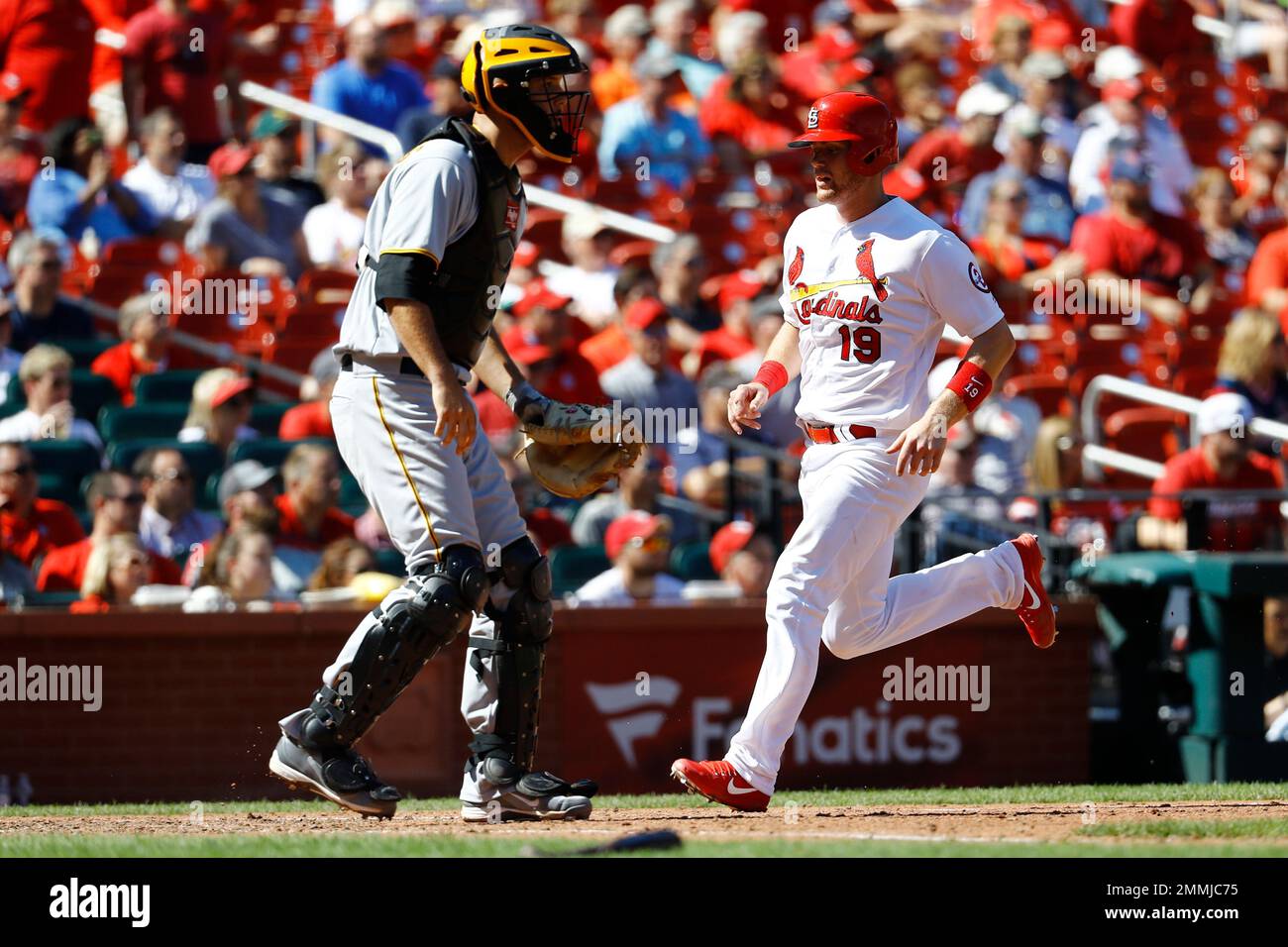 St. Louis Cardinals' Carson Kelly scores as Pittsburgh Pirates catcher ...