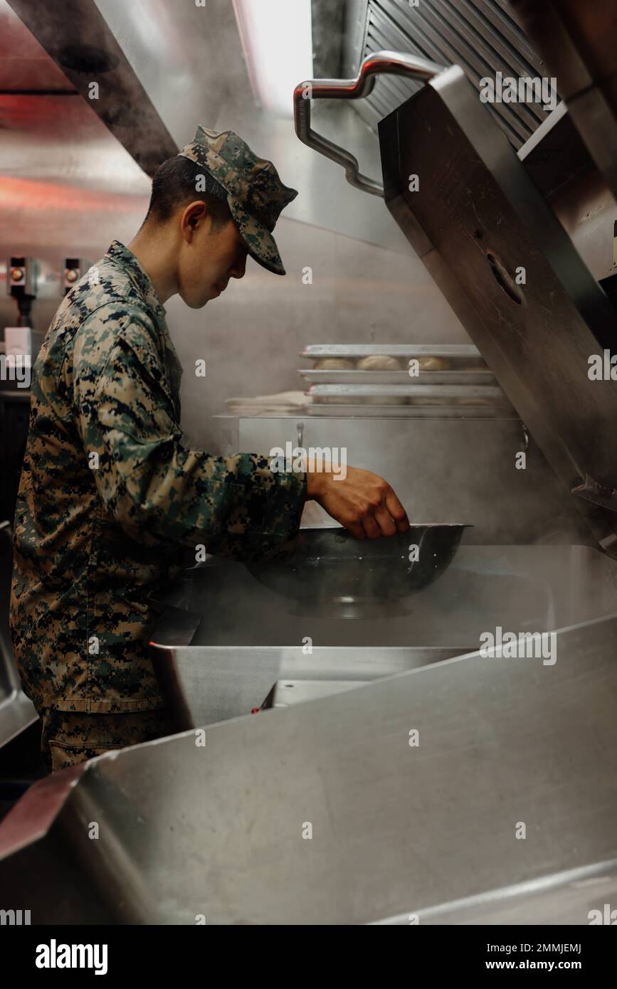 U.S. Marine Corps Cpl. Loc Nguyen, a food service specialist with ...