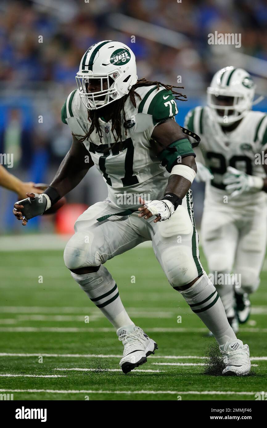 New York Jets offensive guard James Carpenter (77) sets to block ...