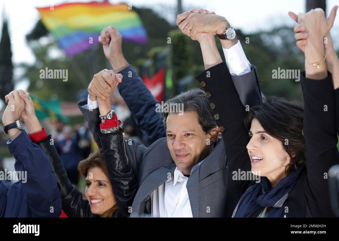 Workers' Party presidential candidate Fernando Haddad, center, and his ...