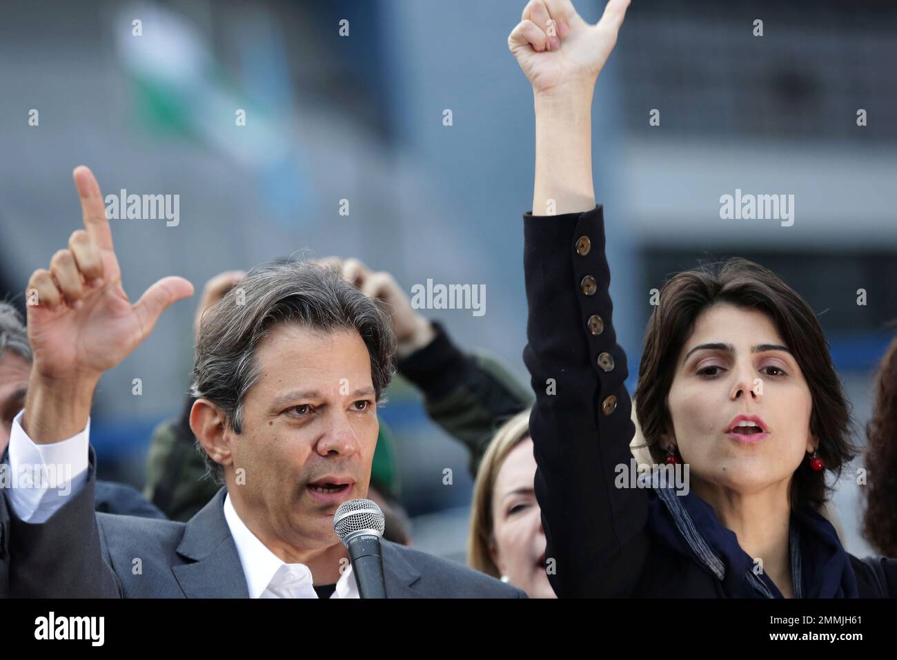 Workers' Party presidential candidate Fernando Haddad, left, and his ...