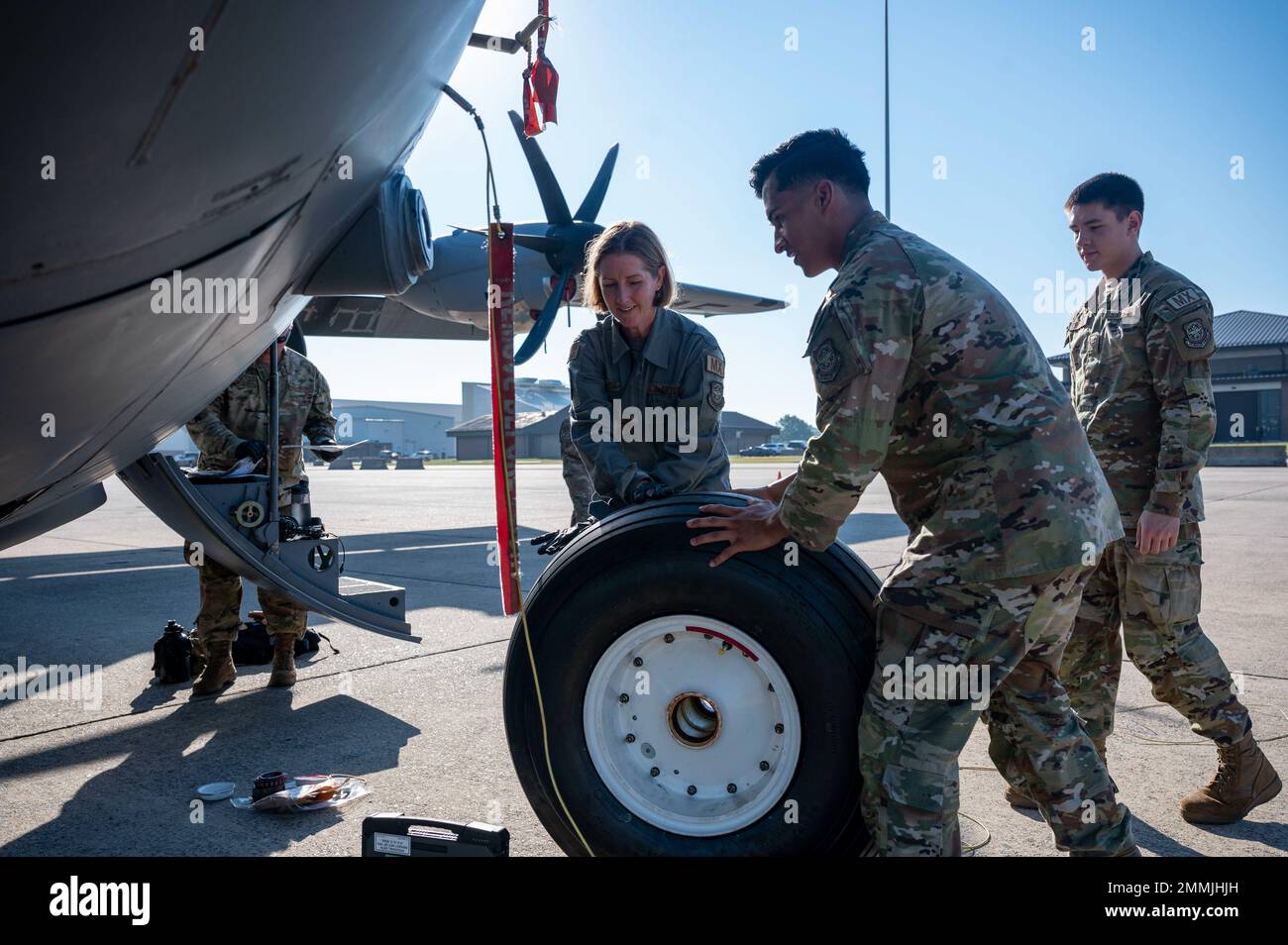 Col. Angela Ochoa, 19th Airlift Wing commander, and Airmen with the ...