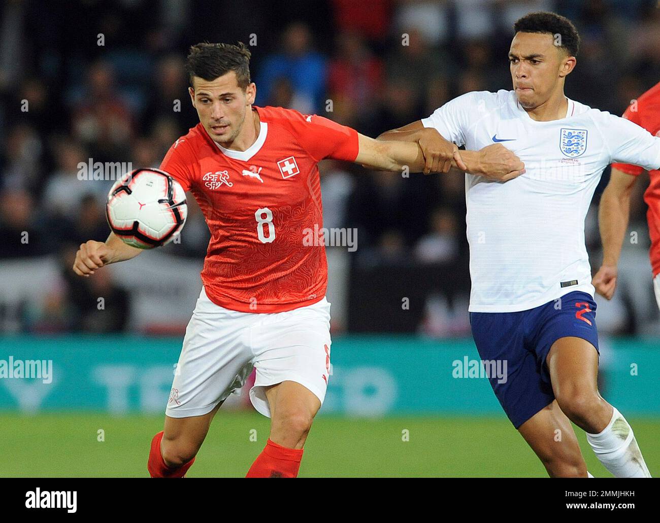 Switzerland's Remo Freuler, left, and England's Trent Alexander-Arnold ...