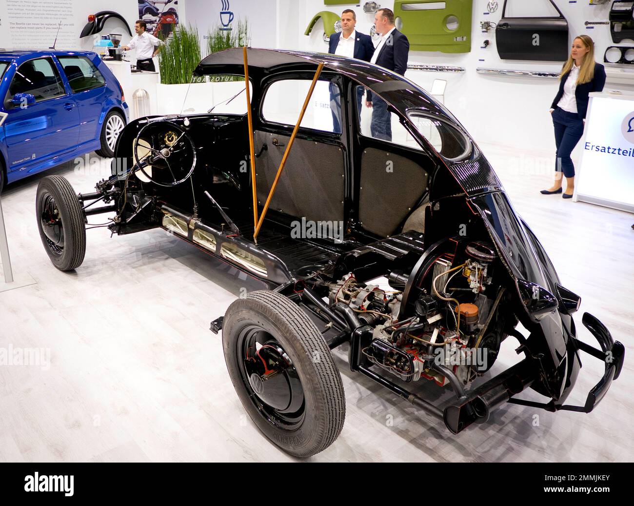 A cross-section model of a Volkswagen Kaefer car of the year 1960 is ...