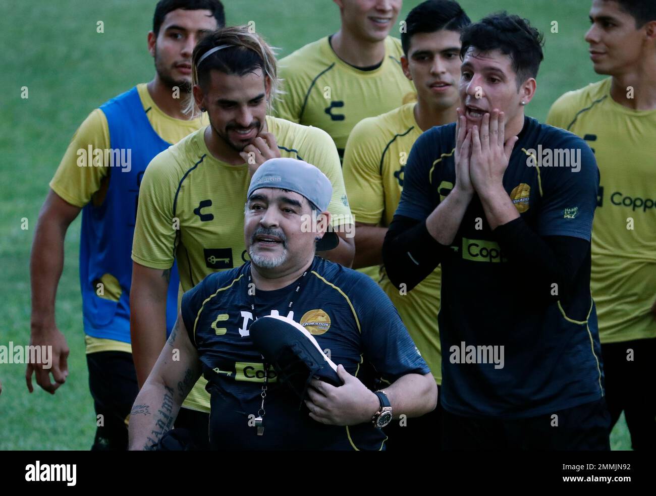 Former soccer great Diego Maradona walks away after a training session ...