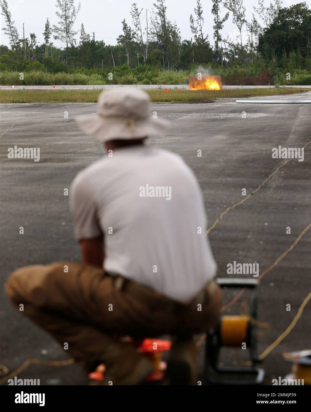 John Bell, foreground, with the Bureau of Fire, Arson, and Explosives ...