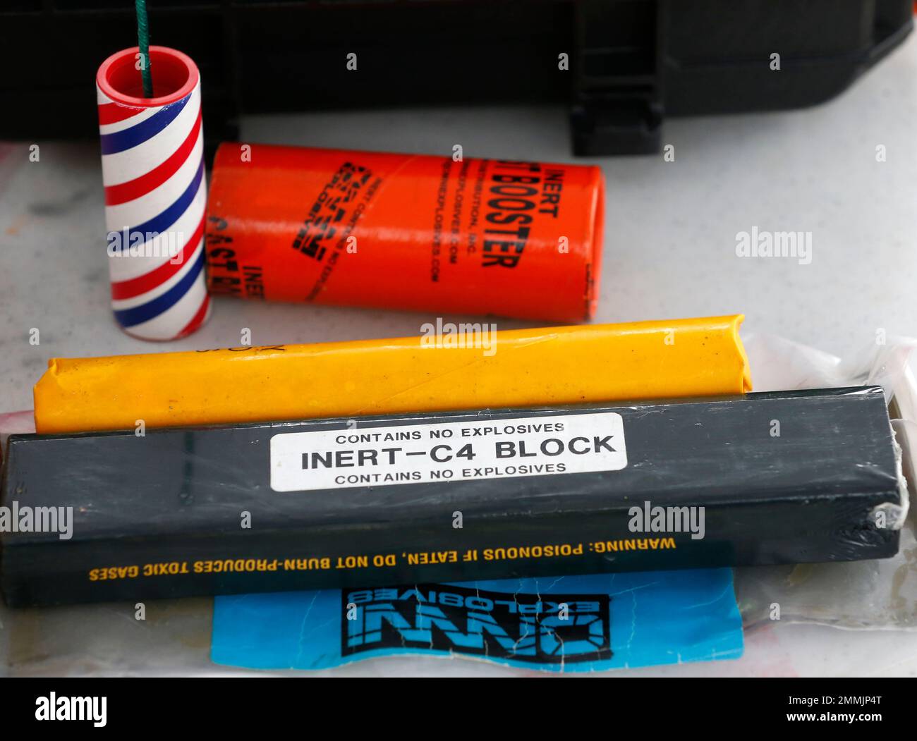 Different examples of explosives are displayed during a class put on by ...