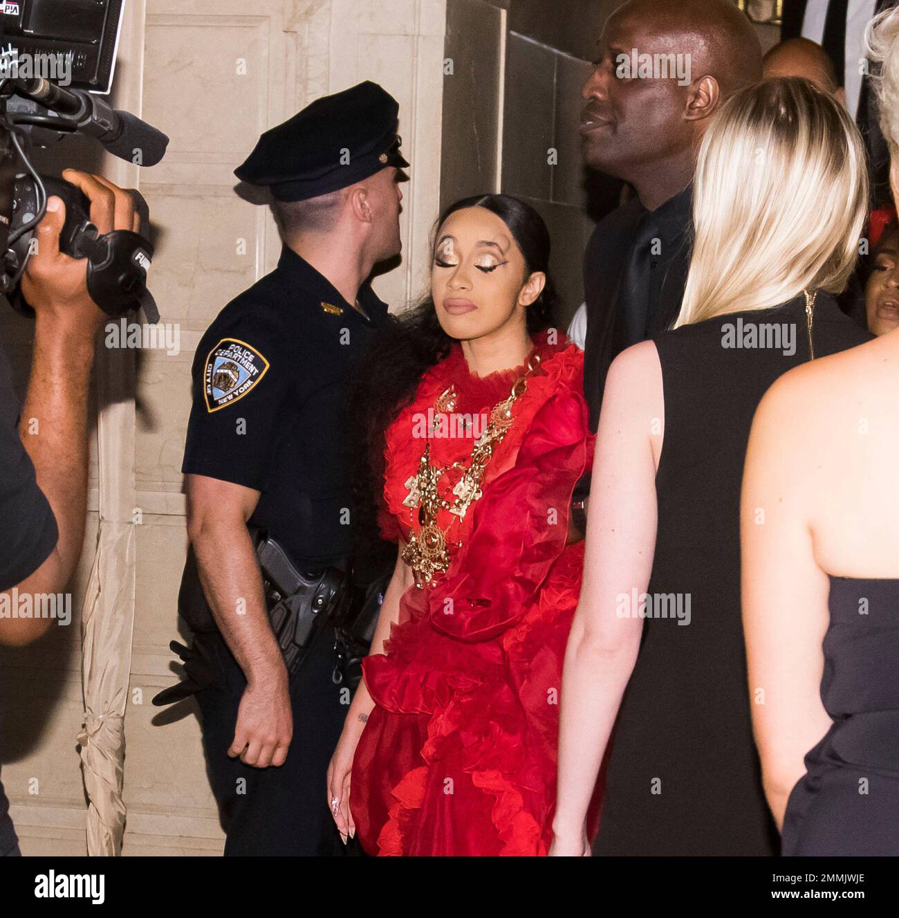 Cardi B, with a bump on her forehead, leaves after an altercation at ...