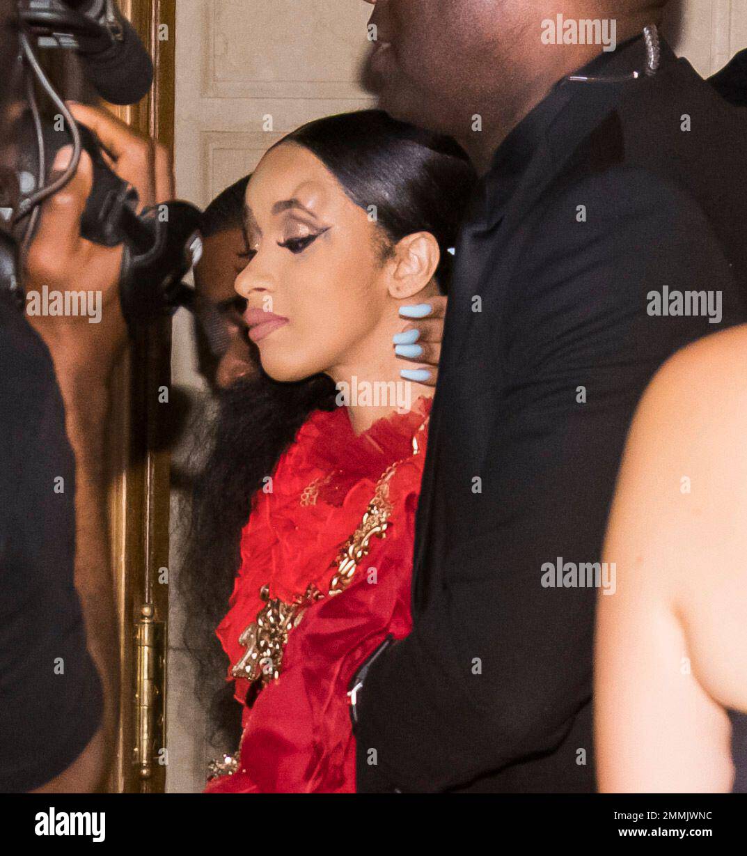 Cardi B, with a bump on her forehead, leaves after an altercation at ...