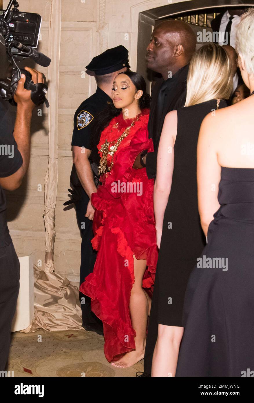 Cardi B, with a bump on her forehead, leaves after an altercation at ...