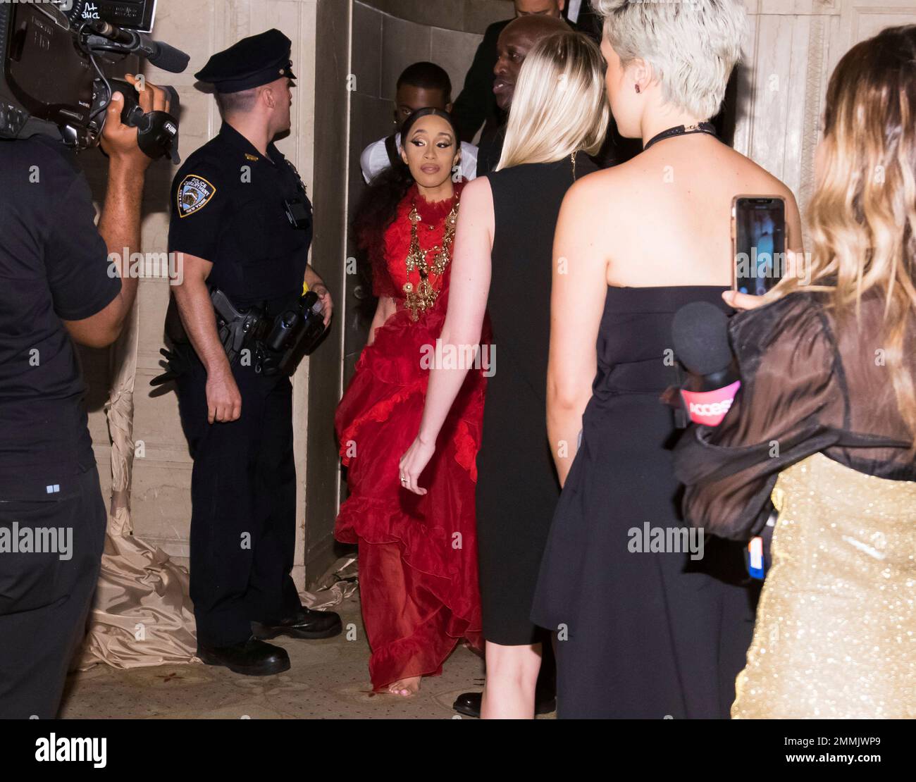 Cardi B, with a bump on her forehead, leaves after an altercation at ...