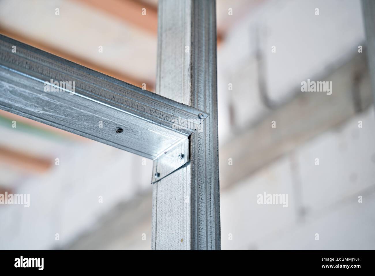 Frame for drywall from a metal profile for a wall close-up on a blurred ...