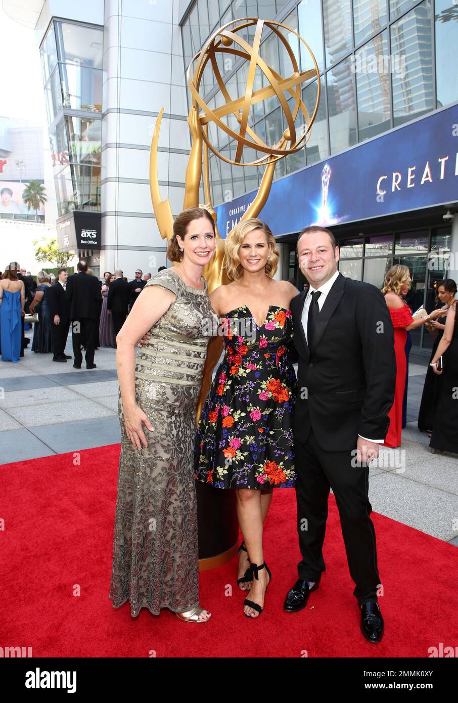 Alison Camillo, from left, Allana Harkin and Pat King arrive at night ...