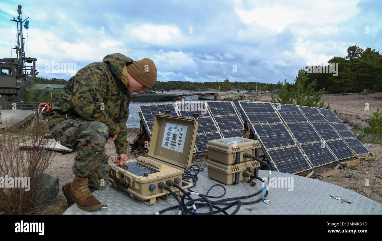 U.S. Marine Corps Pfc. Thomas Aiken, an electrician, with Littoral ...