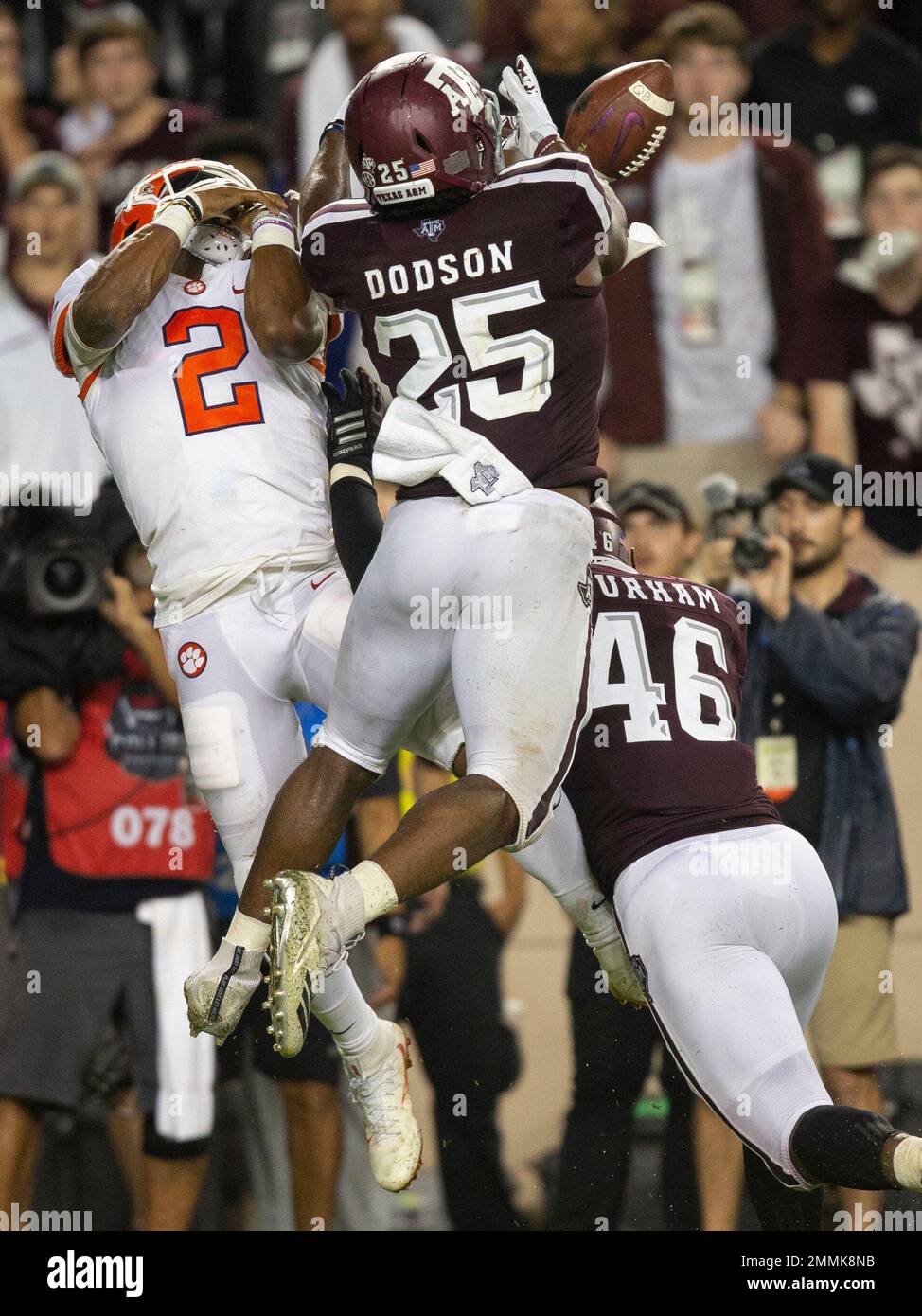 Texas A&M linebacker Tyrel Dodson (25) knocks a ball away from Clemson ...