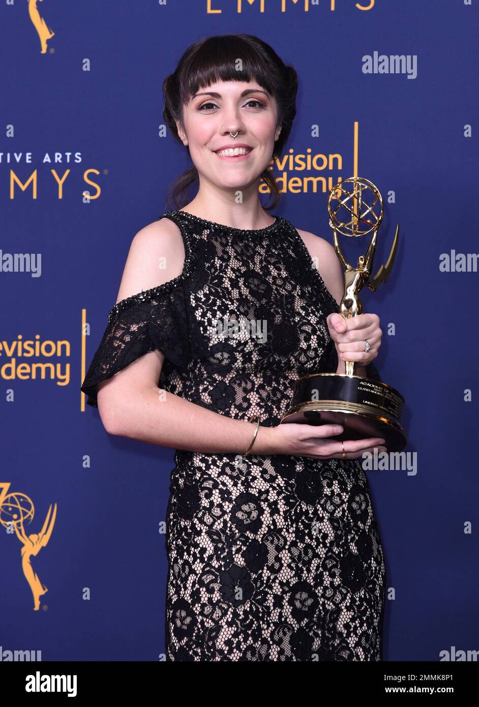 Lindsay Small-Butera, winner of the award for outstanding achievement ...