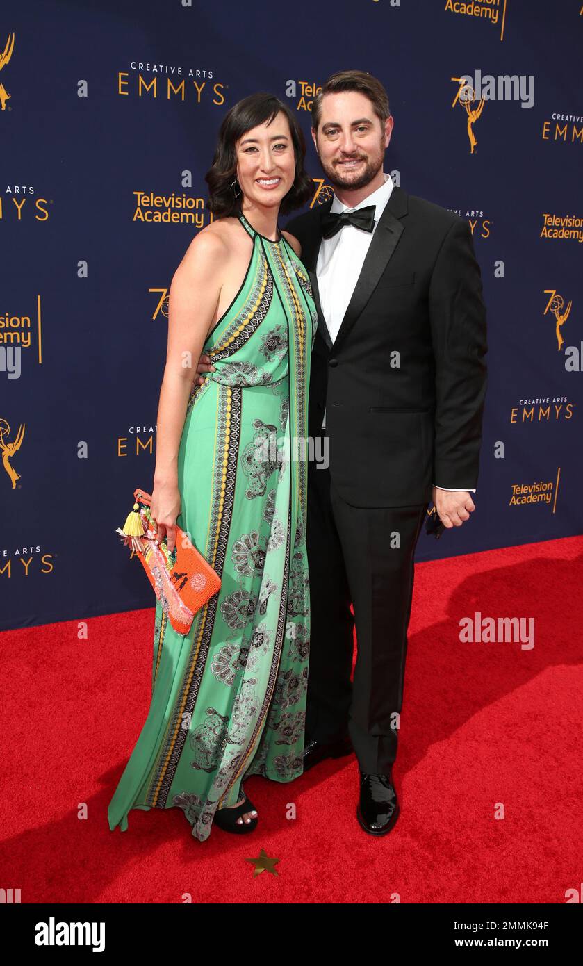 Michelle Pak, left, arrives at night one of the Television Academy's ...