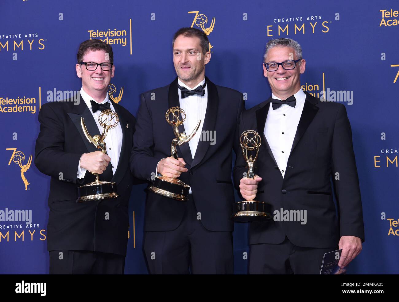 Bob Bronow, from left, Tamas Csaba, and Mark Hensley winners of the ...