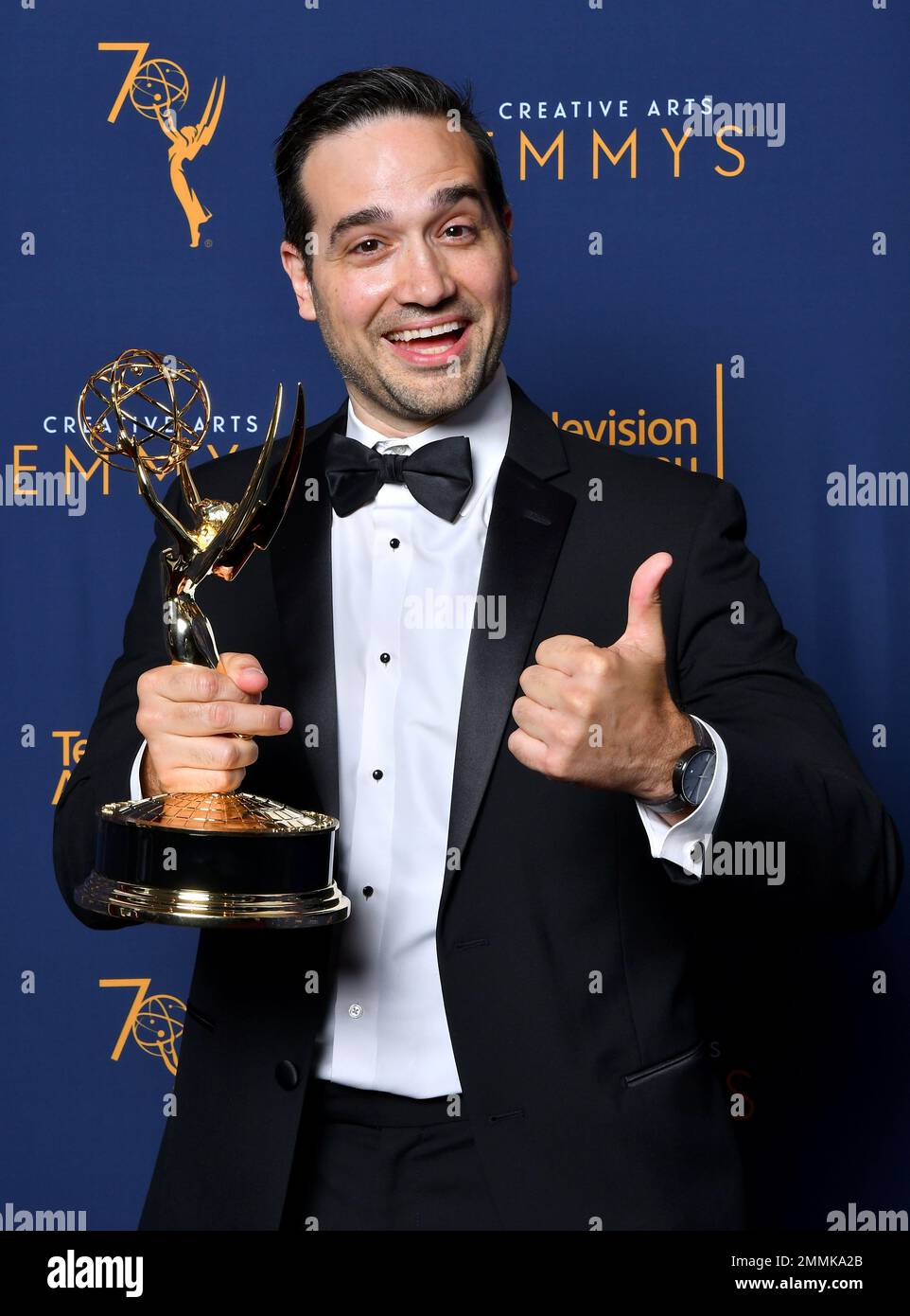 Ryan Ridley, winner of the the award for outstanding animated program ...