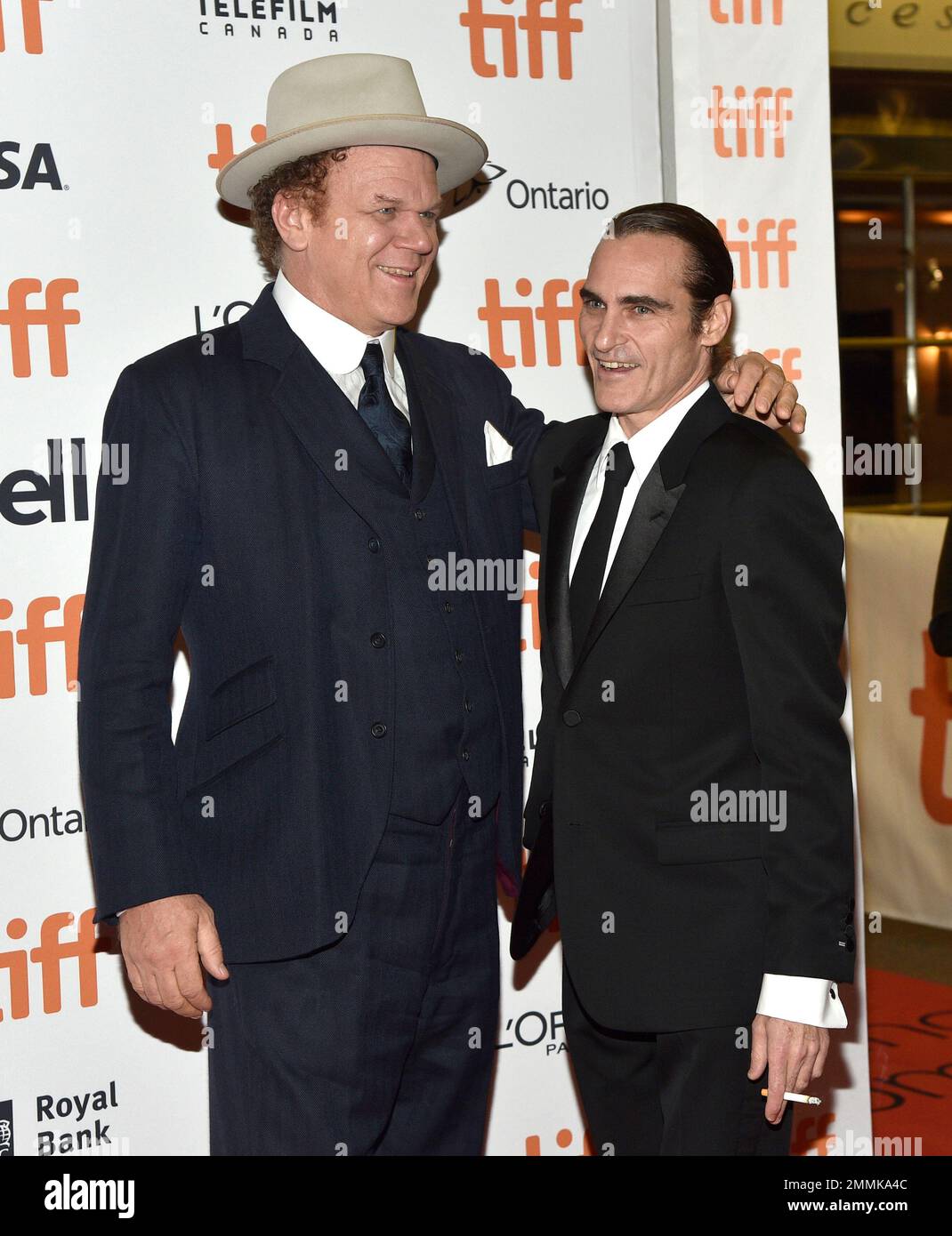 John C. Reilly, left, and Joaquin Phoenix attend the premiere for "The ...