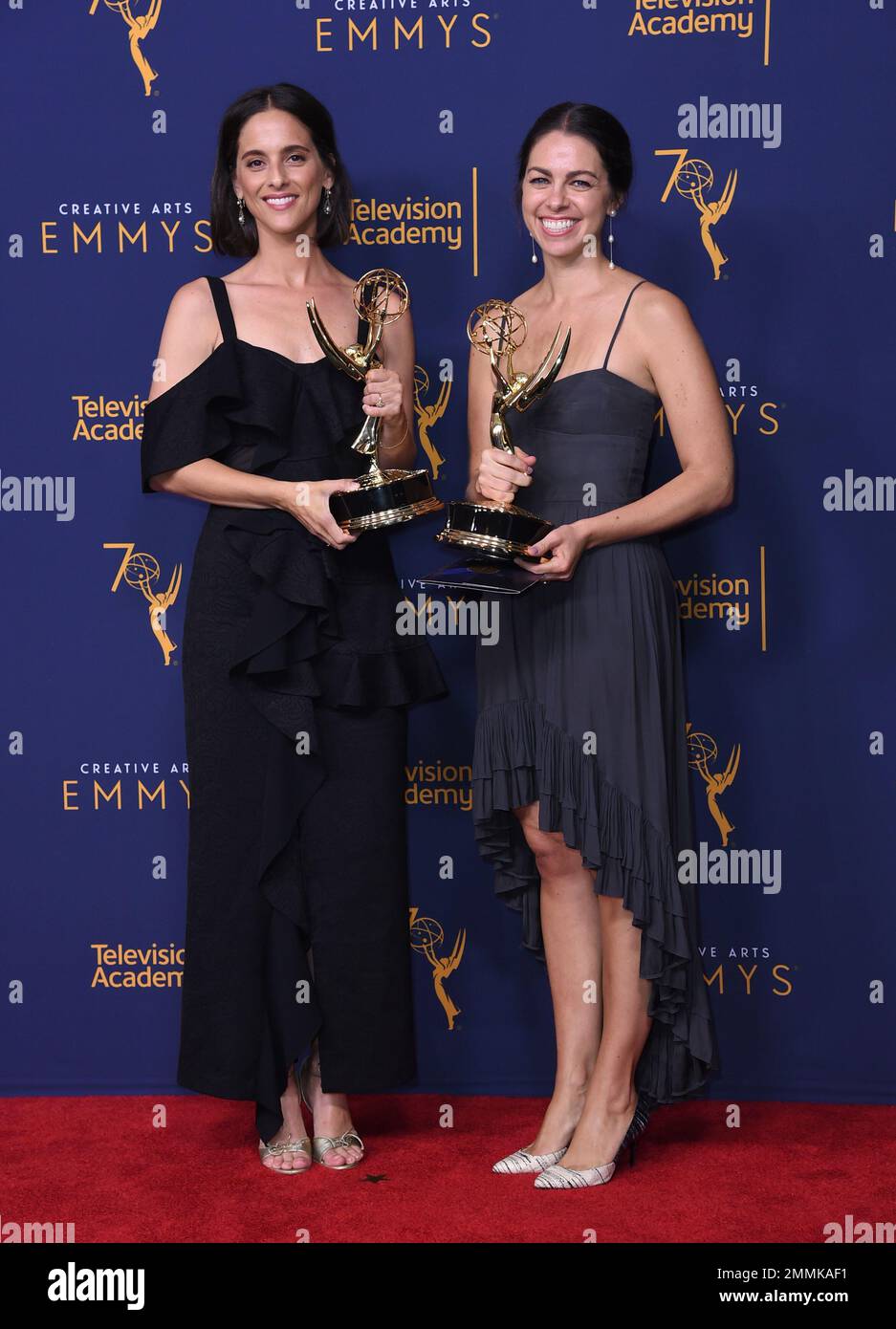Courtney Bright, left, and Nicole Daniels, winners of the award for ...