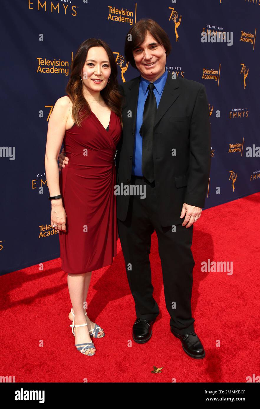 Keiko Dykstra, left, and Adam Dykstra arrive at night one of the ...