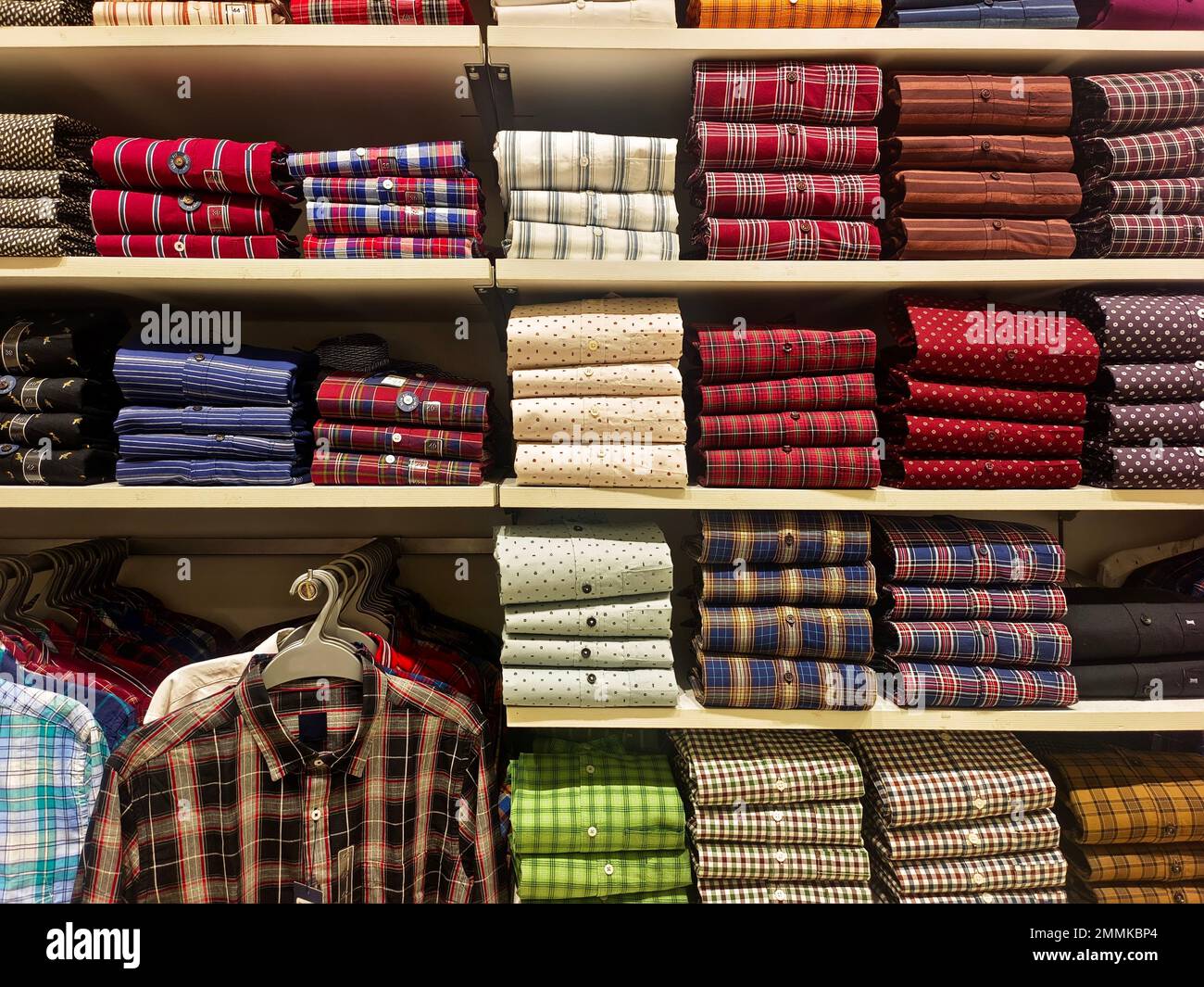 Indian men latest fashion shirts in display retail shop in market ...