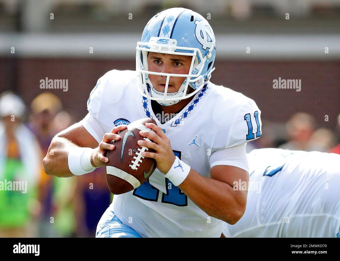North Carolina quarterback Nathan Elliott (11) looks to pass the ball ...