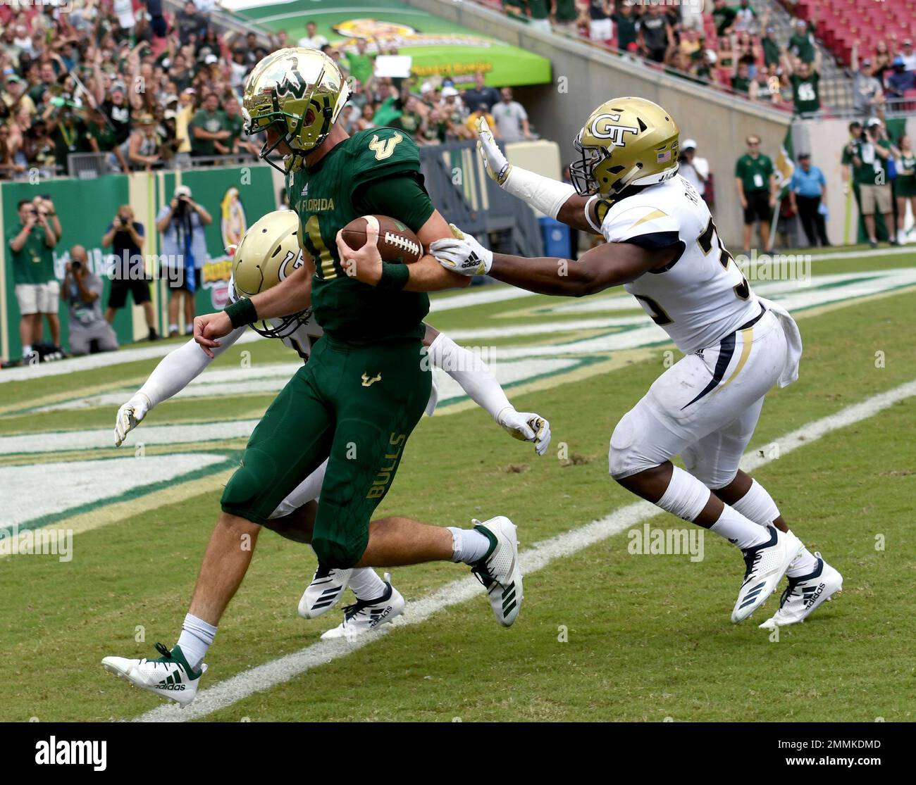 South Florida quarterback Blake Barnett (11) gets in for a touchdown ...