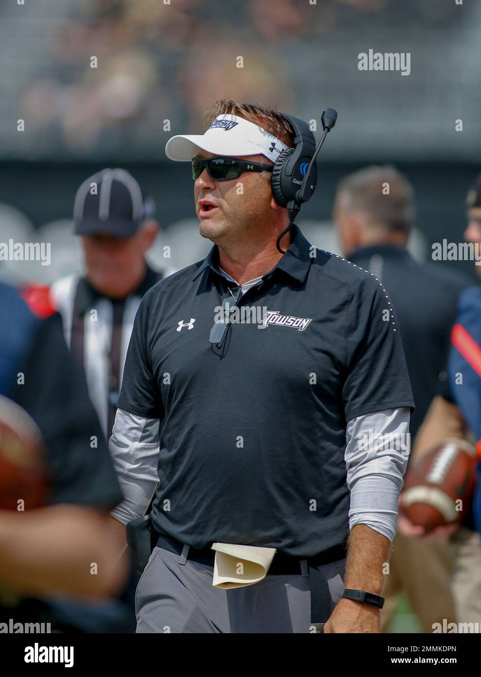 Towson coach Rob Ambrose walks the sidelines in the first half of an ...