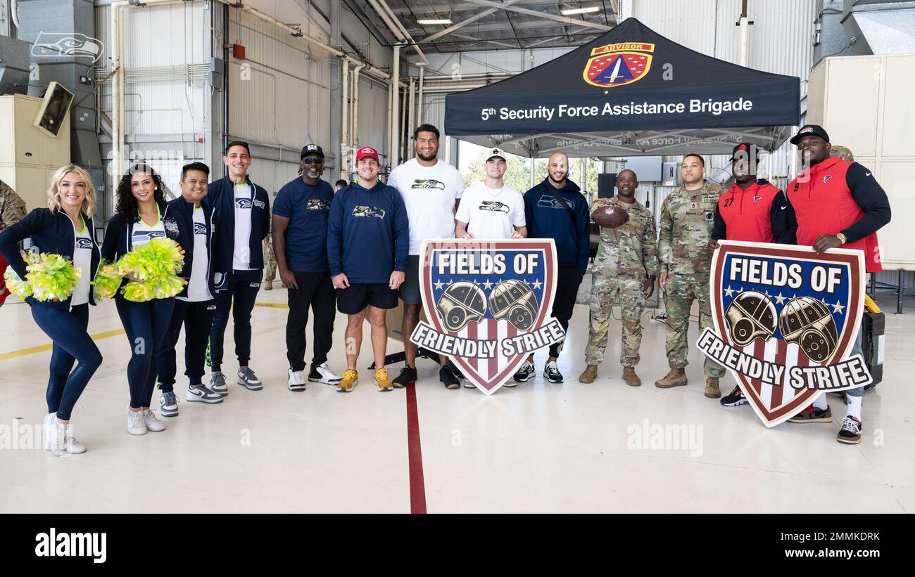 Seattle Seahawks and Atlanta Falcons players pose with the Fields of ...