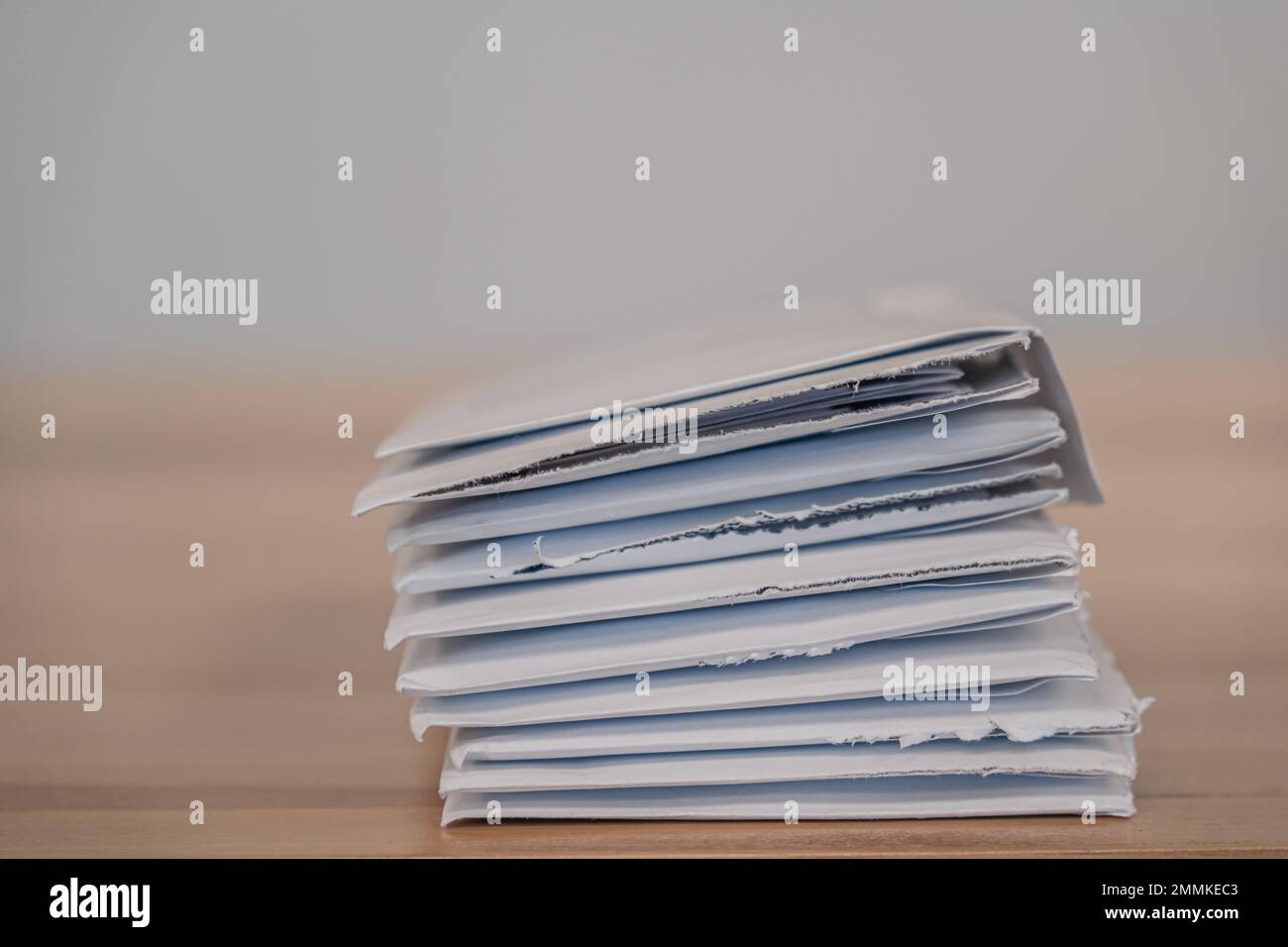 Stack pile of opened envelope letters to read Stock Photo - Alamy