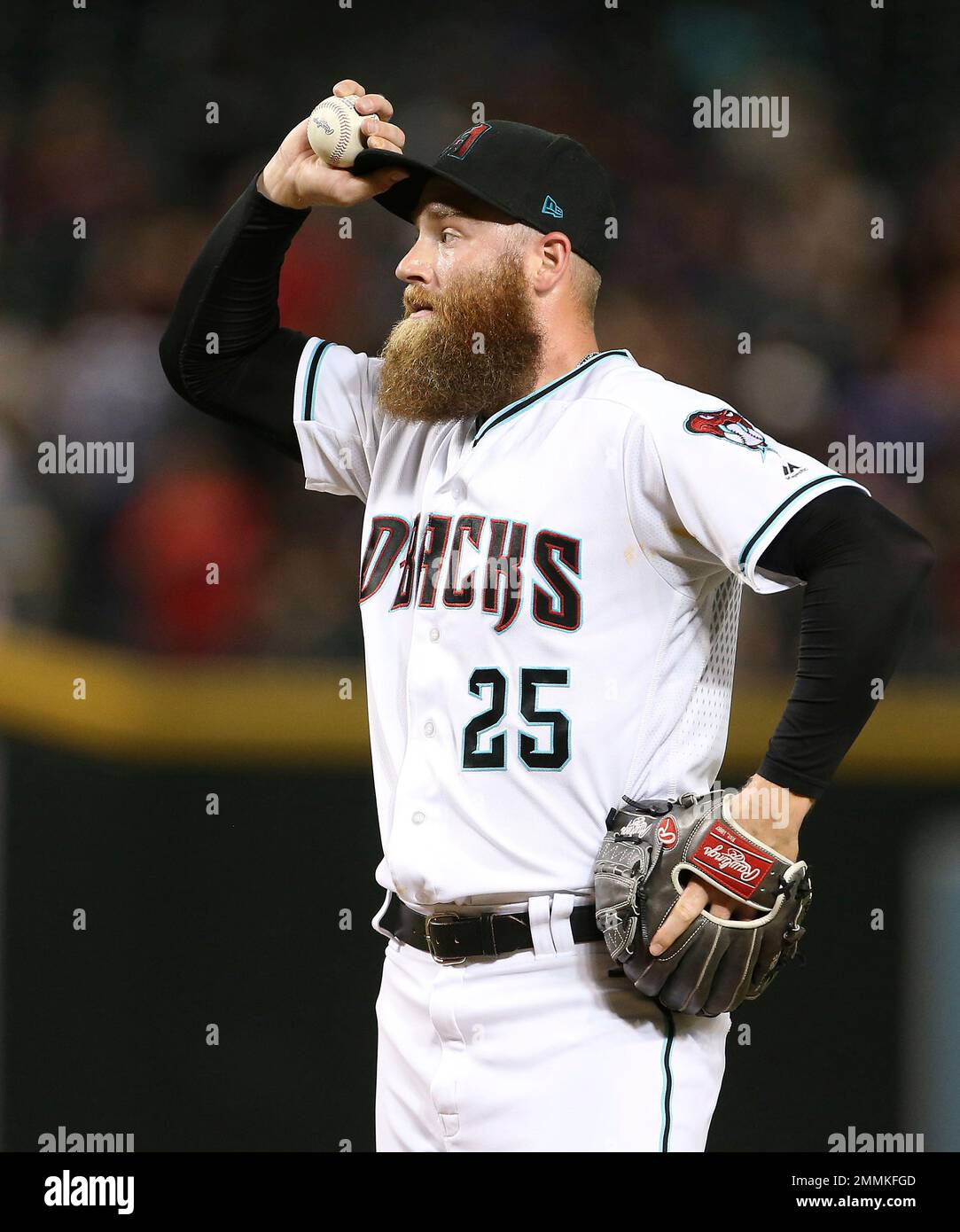 Arizona Diamondbacks relief pitcher Archie Bradley adjust his cap as he ...