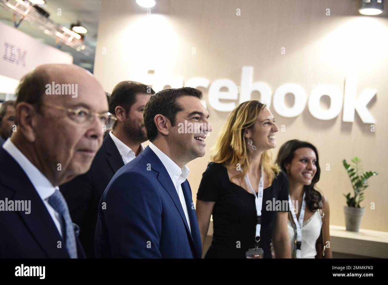 Greece's Prime Minister Alexis Tsipras, center, walks with U.S ...