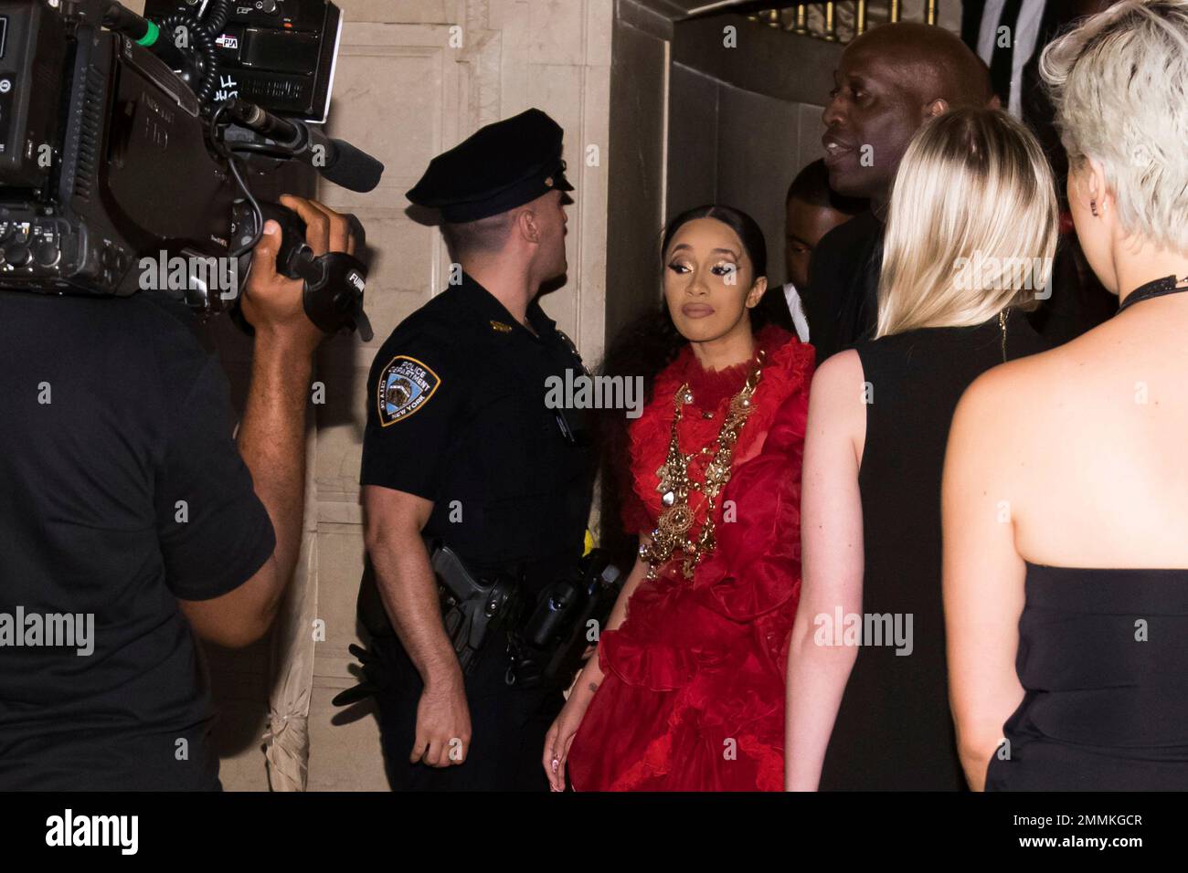 Cardi B, with a swollen bump on her forehead, leaves after an ...
