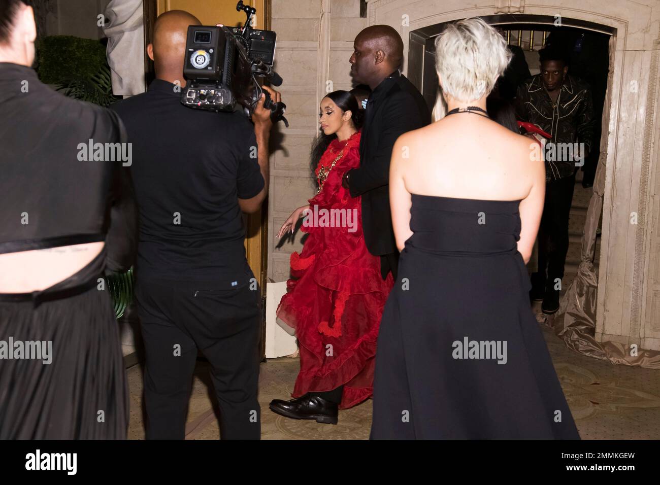 Cardi B, with a swollen bump on her forehead, leaves after an ...