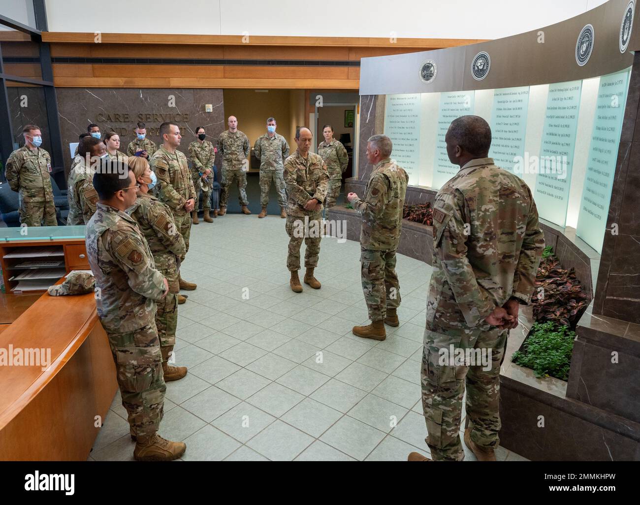 Col. Rudolph Cachuela, Air Mobility Command surgeon general, listens as ...