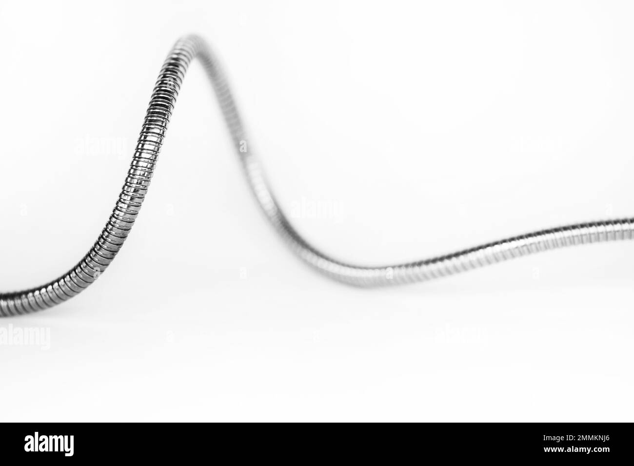 metal power cable for background Stock Photo - Alamy