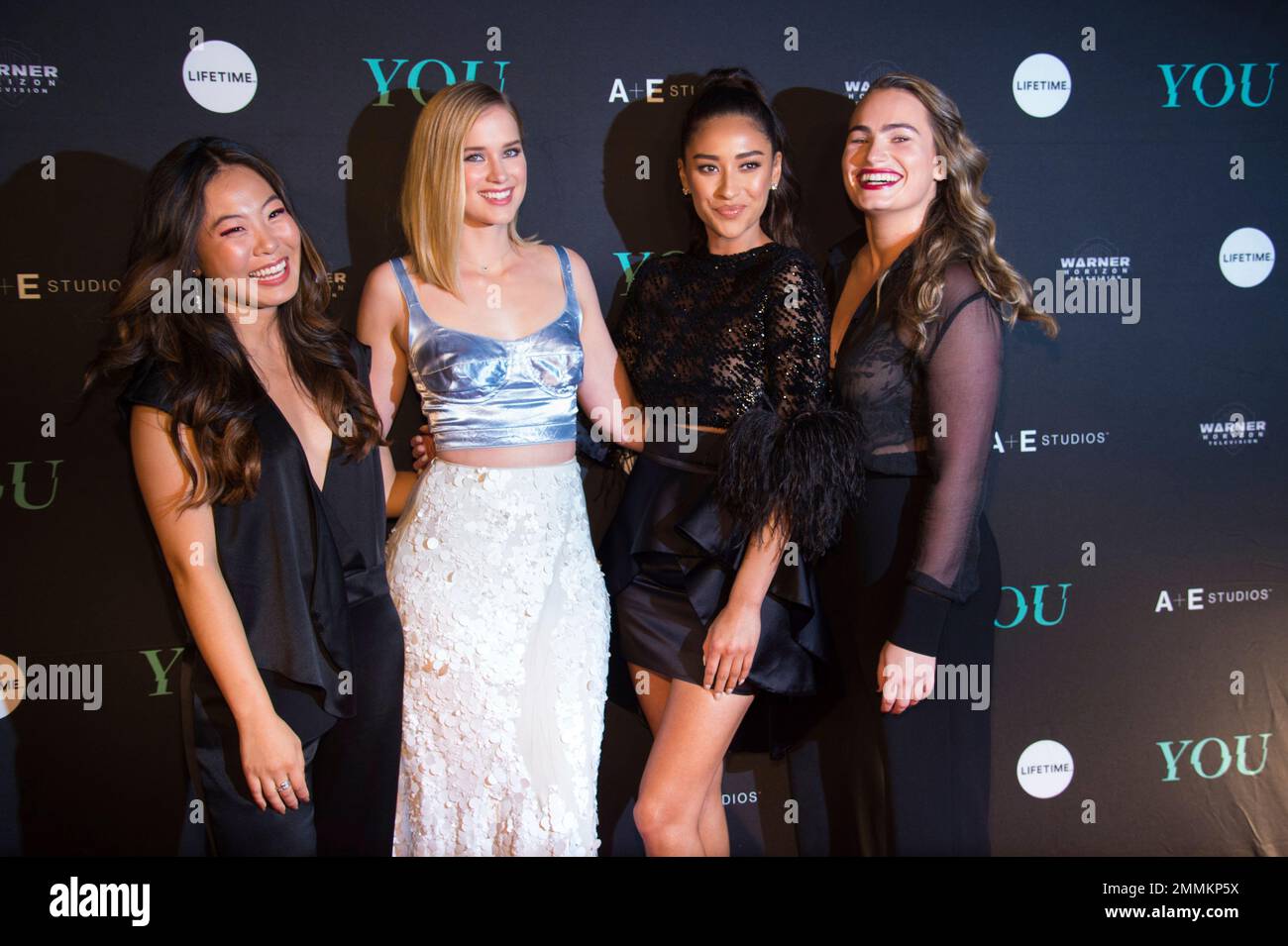 Nicole Kang, from left, Elizabeth Lail, Penn Badgley, Shay Mitchell ...