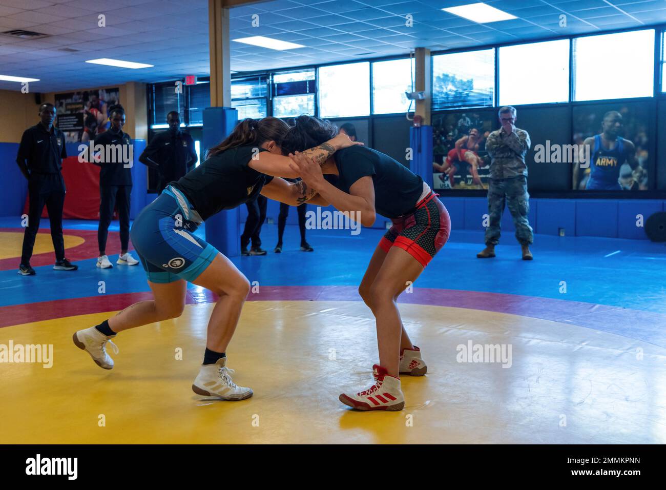 Staff Sgt. Jenna Burkert, and Pfc. Estrella Dorado Marin demonstrate ...