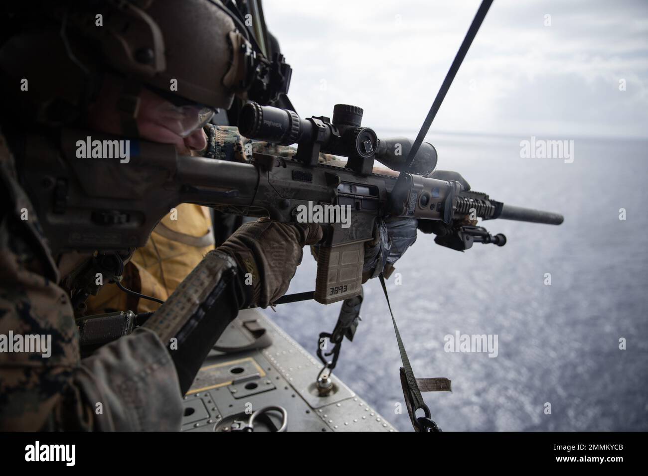 U.S. Marine Corps Cpl. Tristan DeGonia, a scout sniper with Battalion Landing Team 2/5, 31 ...