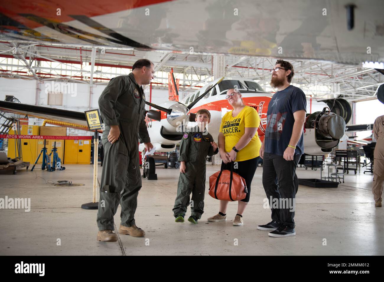 Marine Captain David Brummett shows Seth Wilkey, Pilot for a Day, and ...