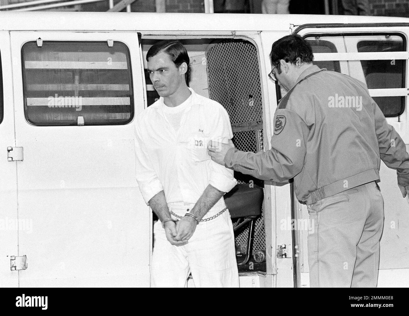 Convicted killer James David Autry is led from a van that brought him ...