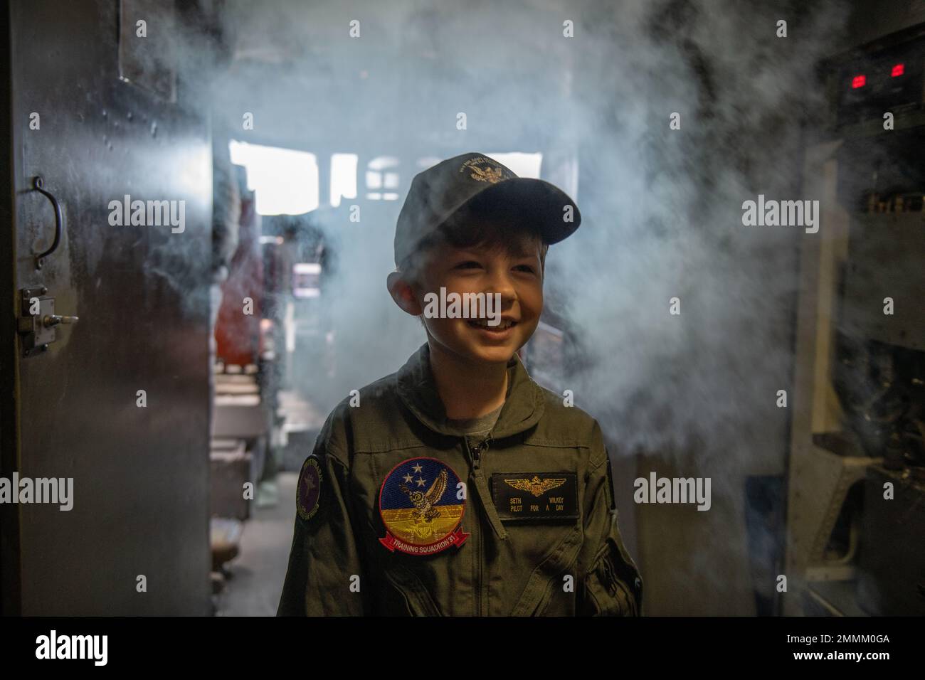 Seth Wilkey, Pilot for a Day, walks through water vapor created by the ...