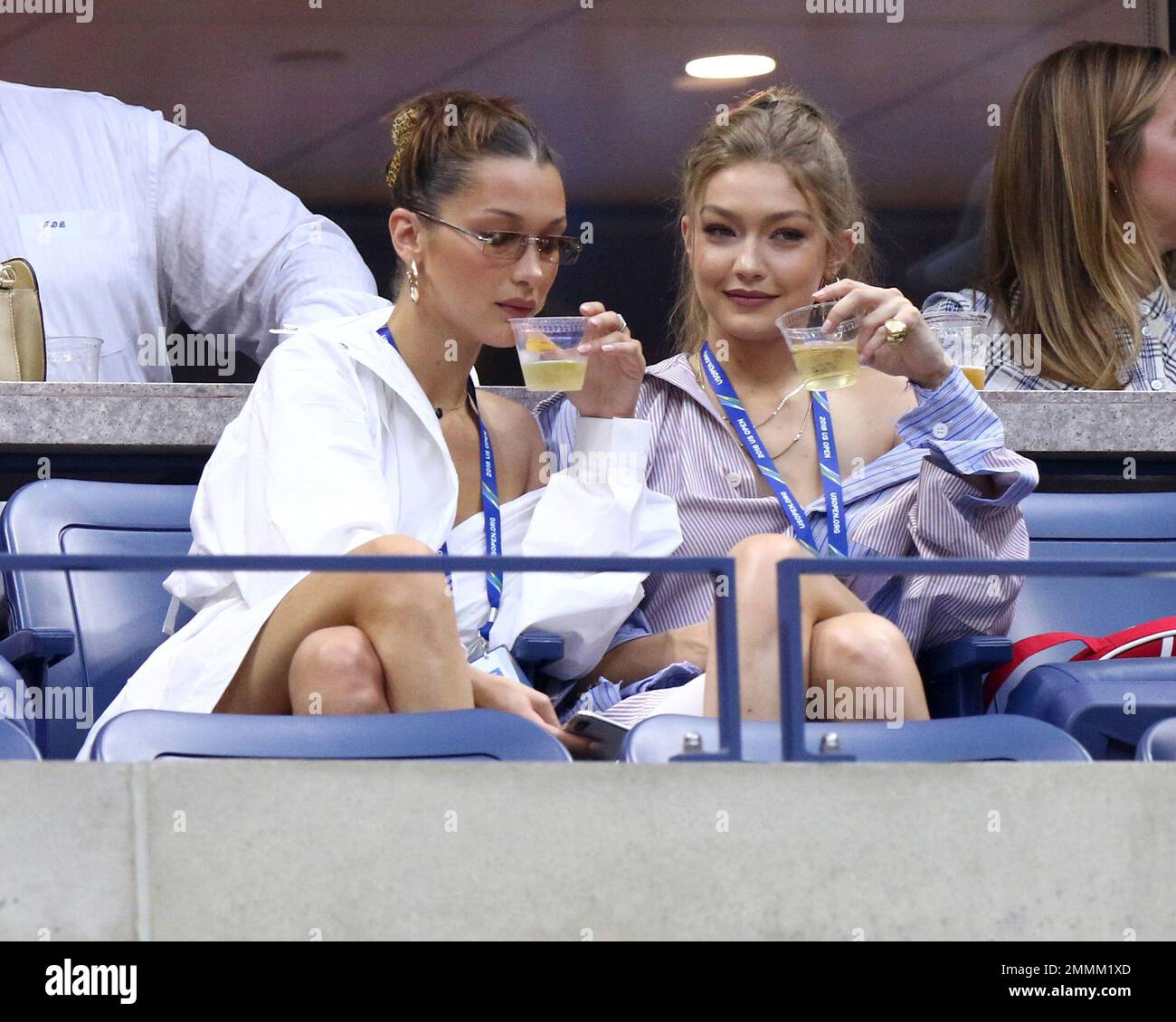 Bella Hadid, left, and Gigi Hadid attend the quarterfinals of the U.S ...