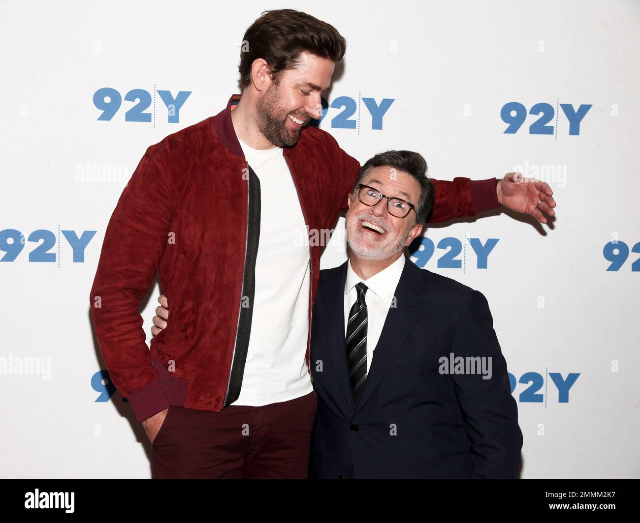 Actor/director John Krasinski, left, poses with Stephen Colbert, right ...