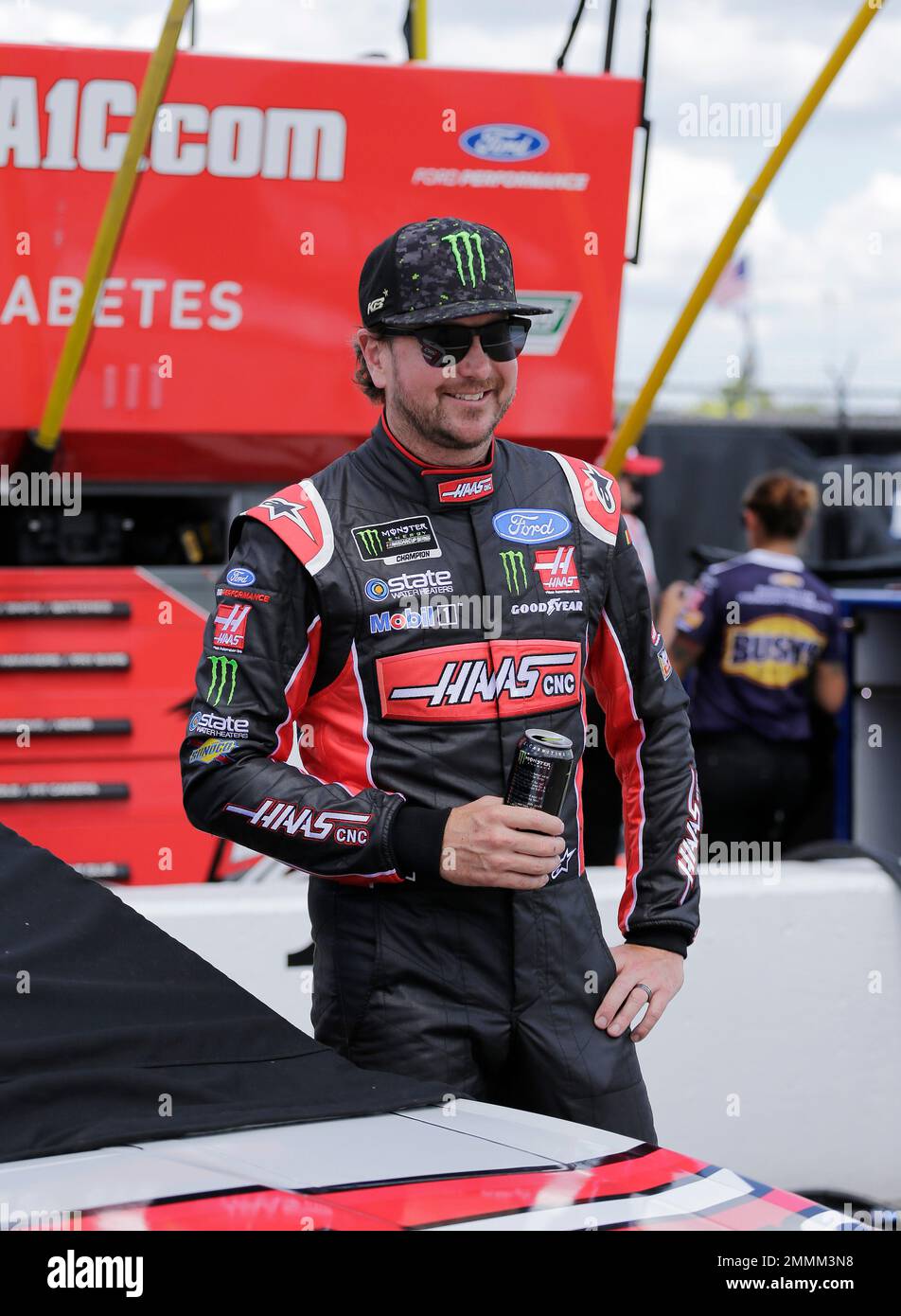 Kurt Busch stands by his car before qualifying for a NASCAR Cup Series ...