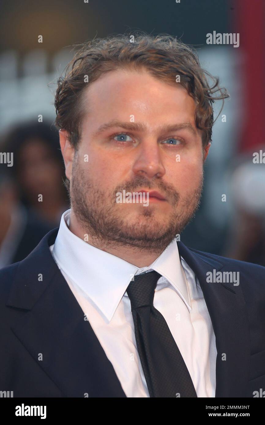 Director Brady Corbet poses for photographers at the premiere of the ...
