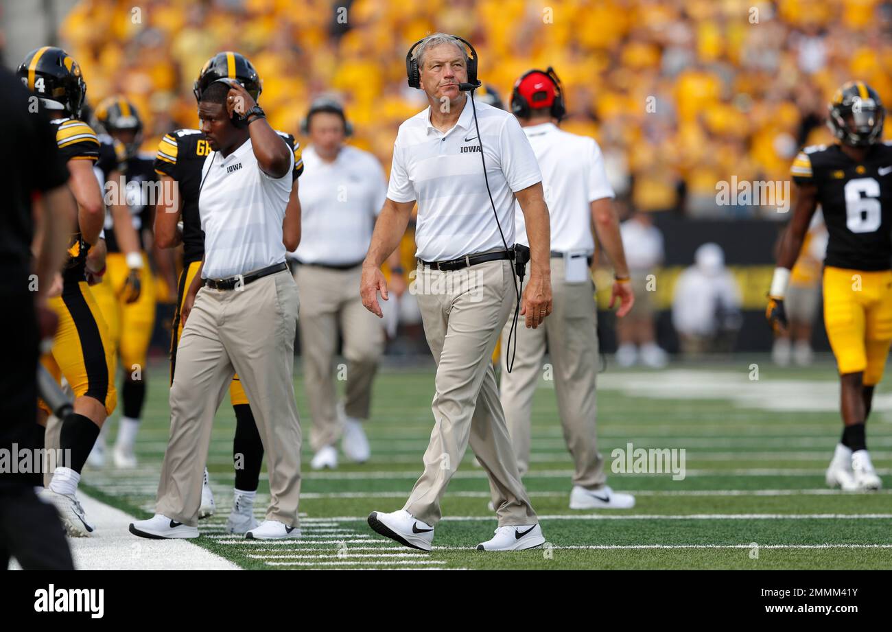 Iowa head coach Kirk Ferentz walks on the sideline during the first ...