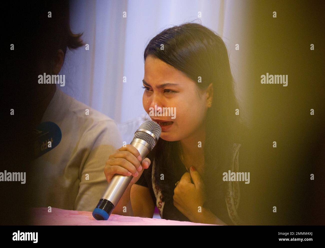 Chit Su Win, wife of a Reuters journalist Kyaw Soe Oo, cries as she ...